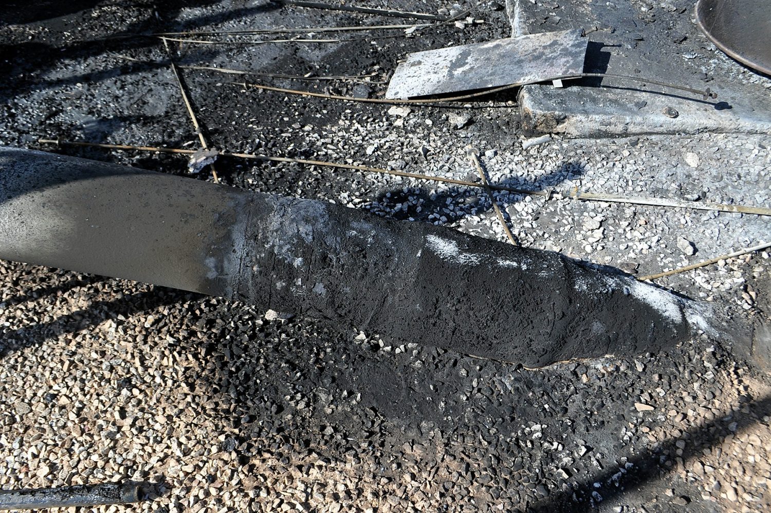 G2MT Labs Fire damage assessment close-up view of charred composite ...